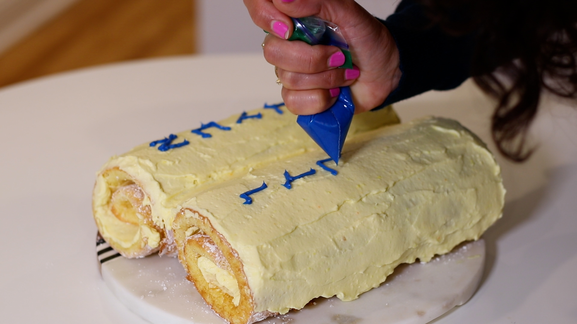 Shavuot Milk & Honey Torah Roll Cake - Reconstructing Judaism